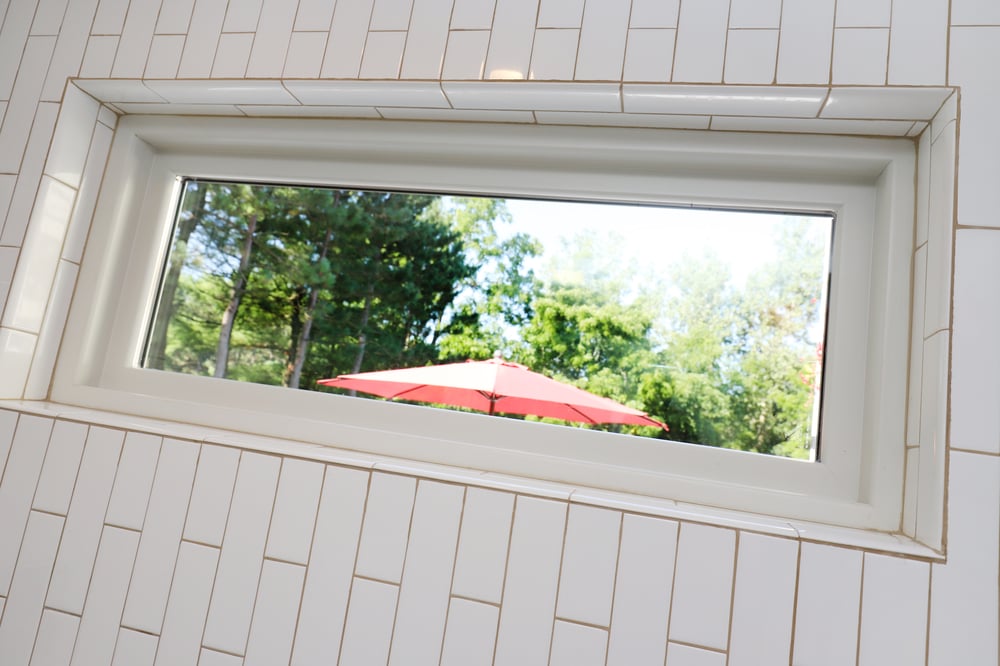 Looking for a creative way to add a window? Consider a transom window.